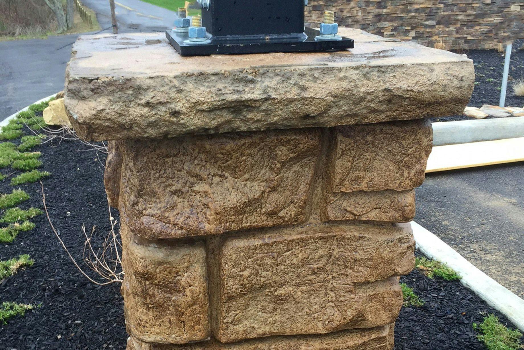 Wood Light Poles Paired with Ledgestone Provide Park Appeal | Pole Base
