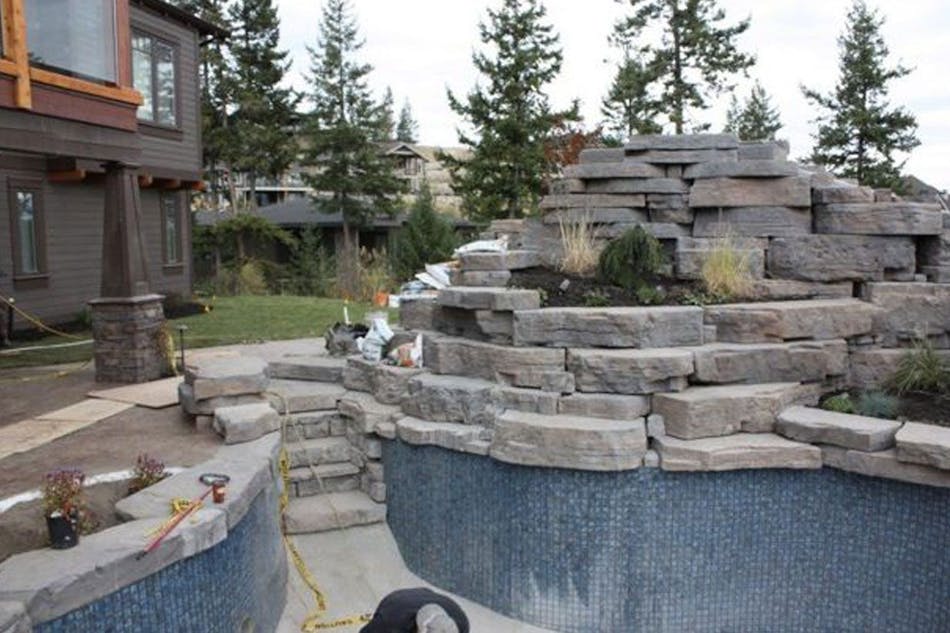 Rosetta Walls Transform Cliff Into Pool Lagoon & Play Area