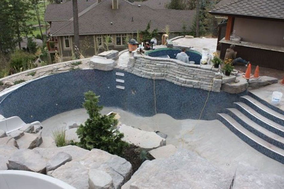 Rosetta Walls Transform Cliff Into Pool Lagoon & Play Area